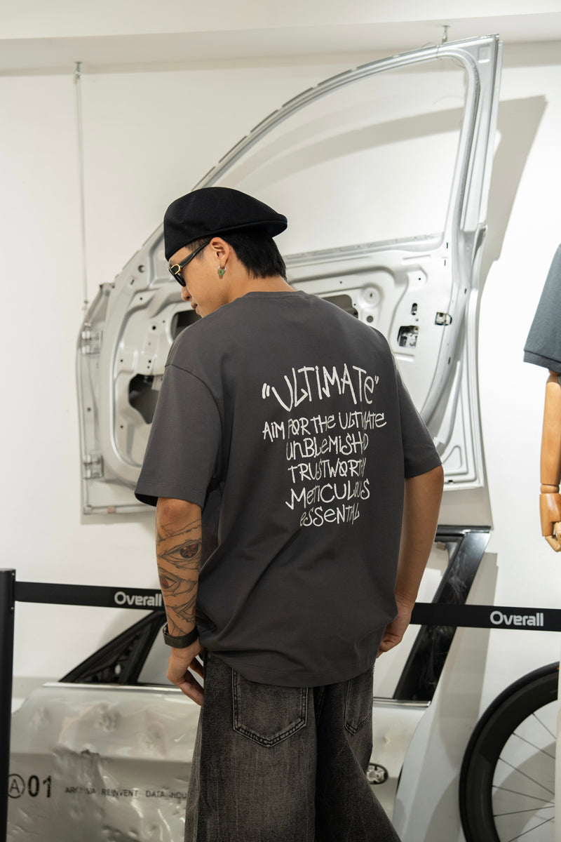 ULTIMATE 25SS SLOGAN PRINTED TEE – MCWEARS